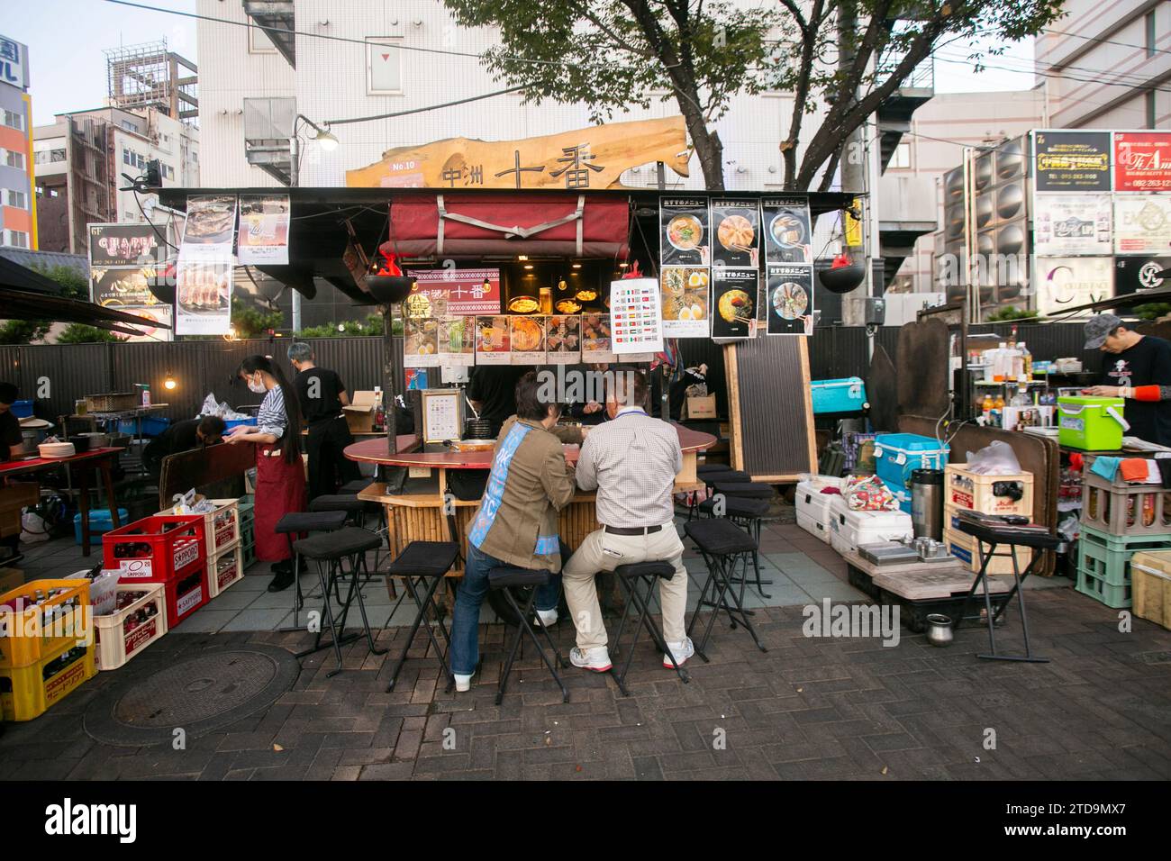 Fukuoka, Japan; 1st October 2023: People eating and drinking in a Yatai ...