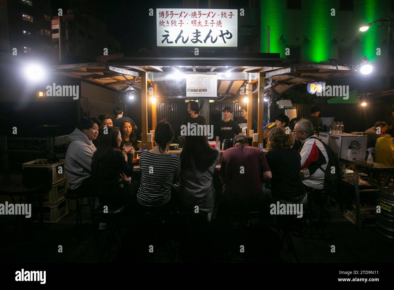 Fukuoka, Japan; 1st October 2023: People eating and drinking in a Yatai ...