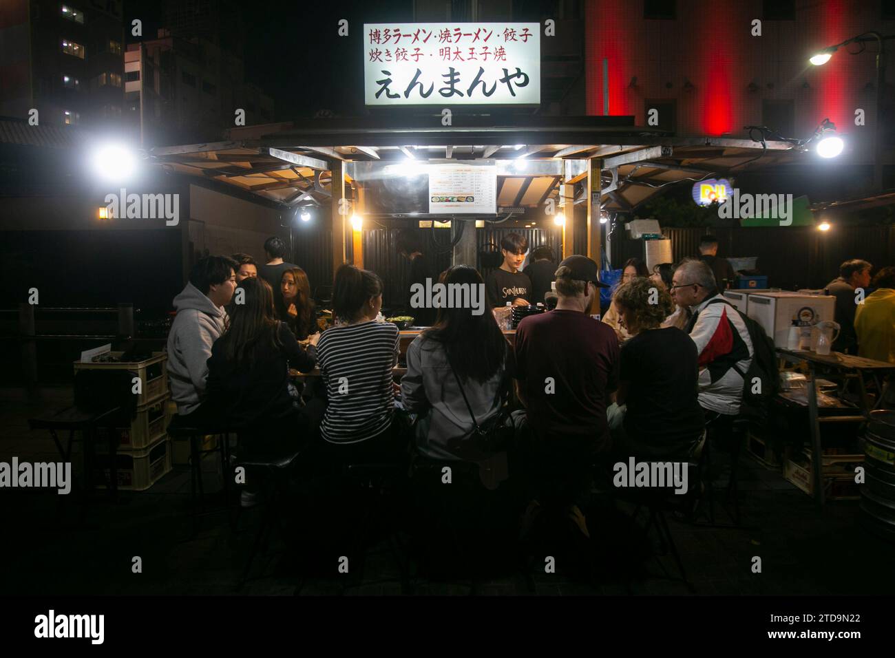 Fukuoka, Japan; 1st October 2023: People eating and drinking in a Yatai ...