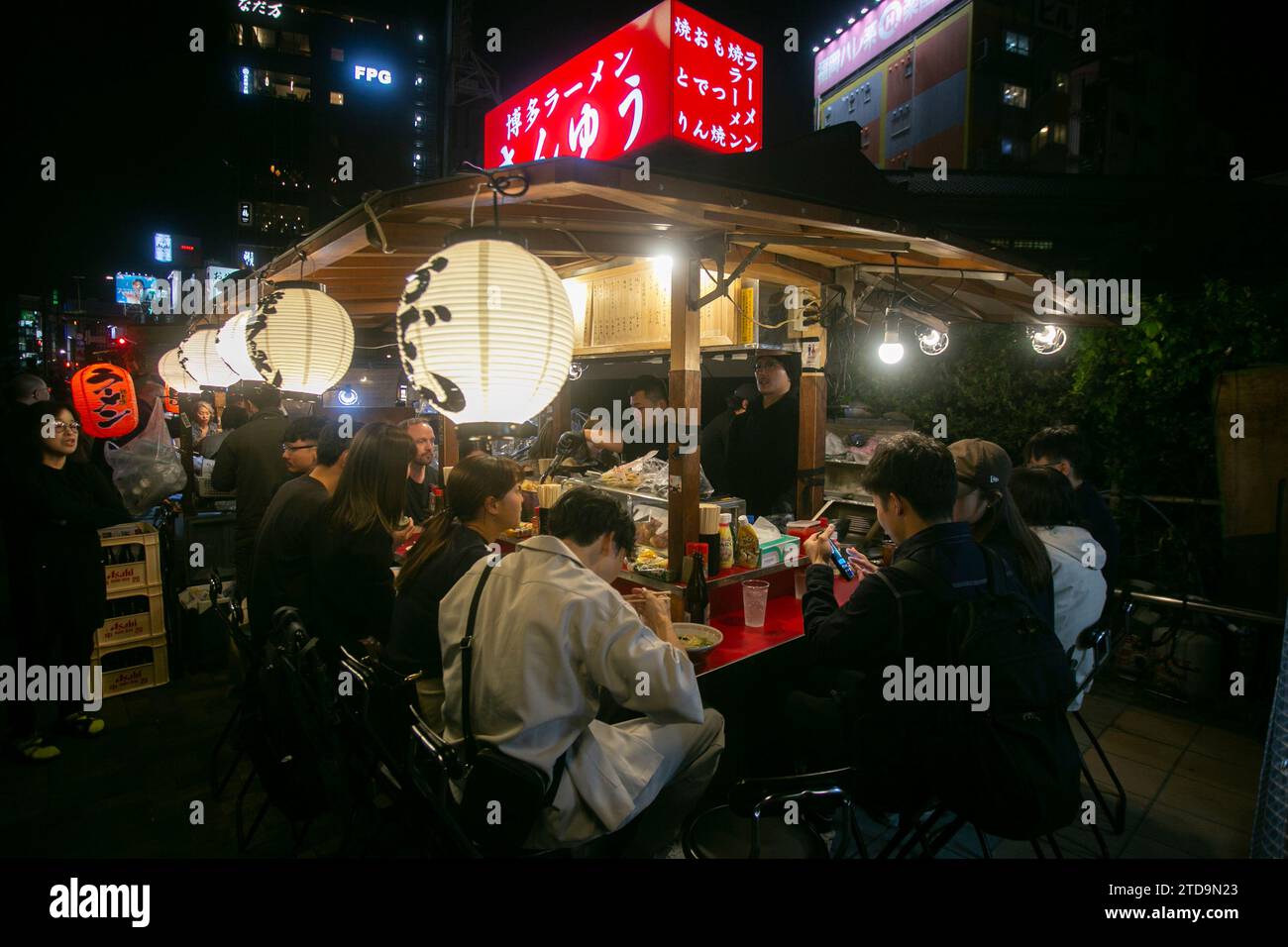 Fukuoka, Japan; 1st October 2023: People eating and drinking in a Yatai ...