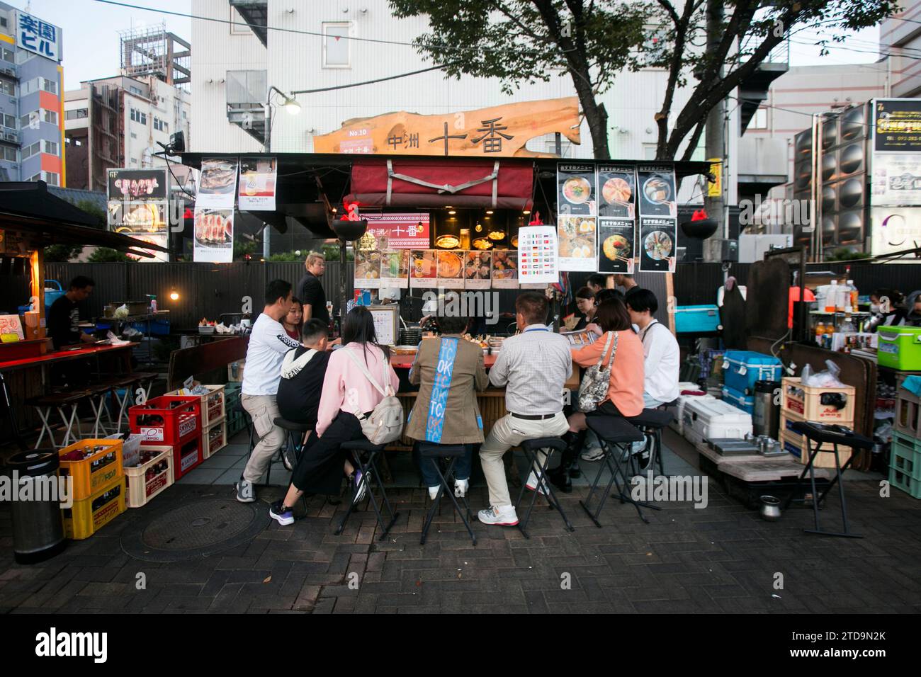 Fukuoka, Japan; 1st October 2023: People eating and drinking in a Yatai ...