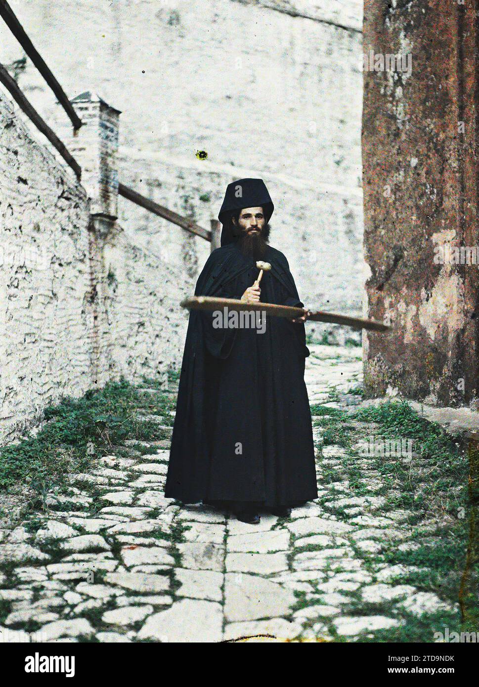 Monk ringing prayer time hi-res stock photography and images - Alamy