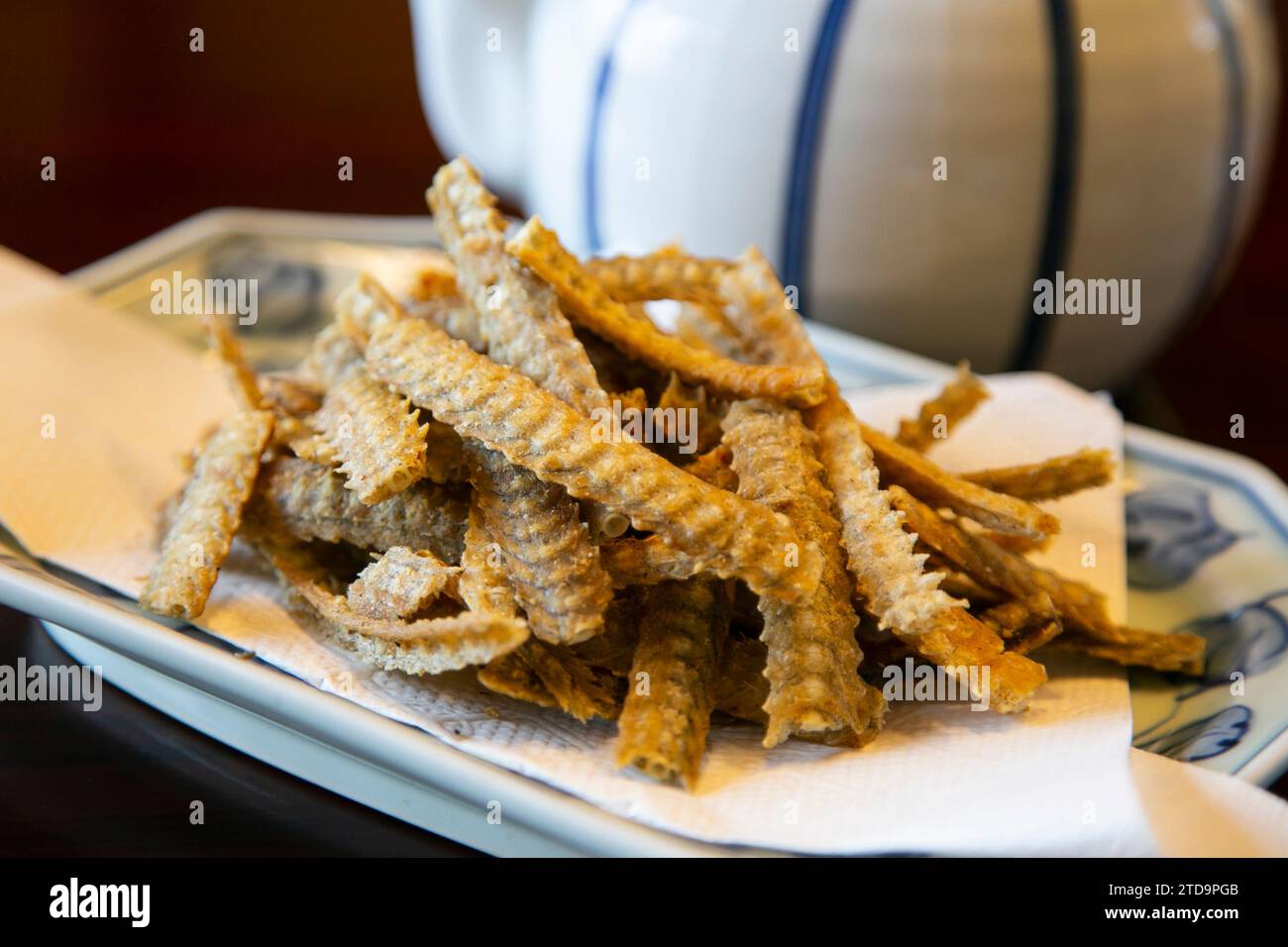 Fried eel bone. Crispy starter at a luxury Japanese restaurant in Tokyo ...