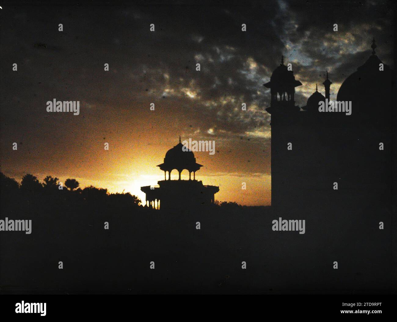 Agra, India Sunset over a surrounding pavilion and the corner of the ...