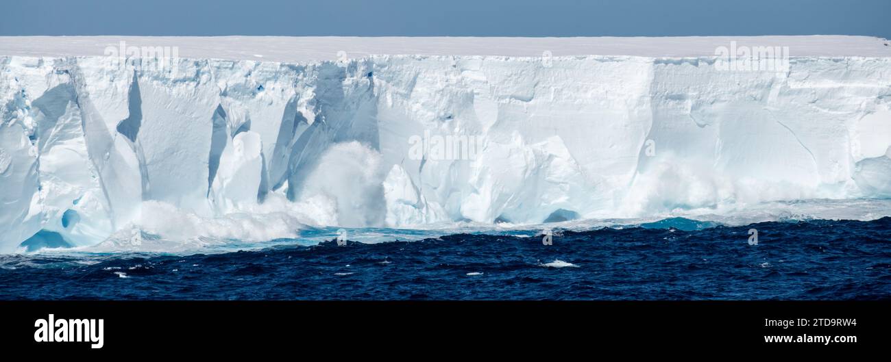 Antarctica, South Orkney Islands. Waves crashing on large tabular ...