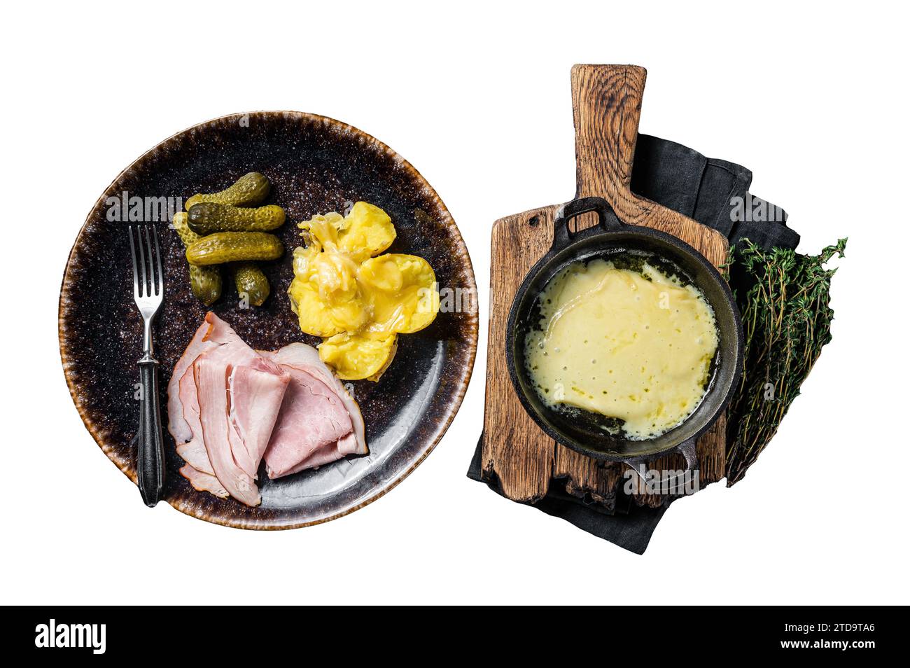 Raclette Melted cheese with boiled potato and ham on rustic plate ...