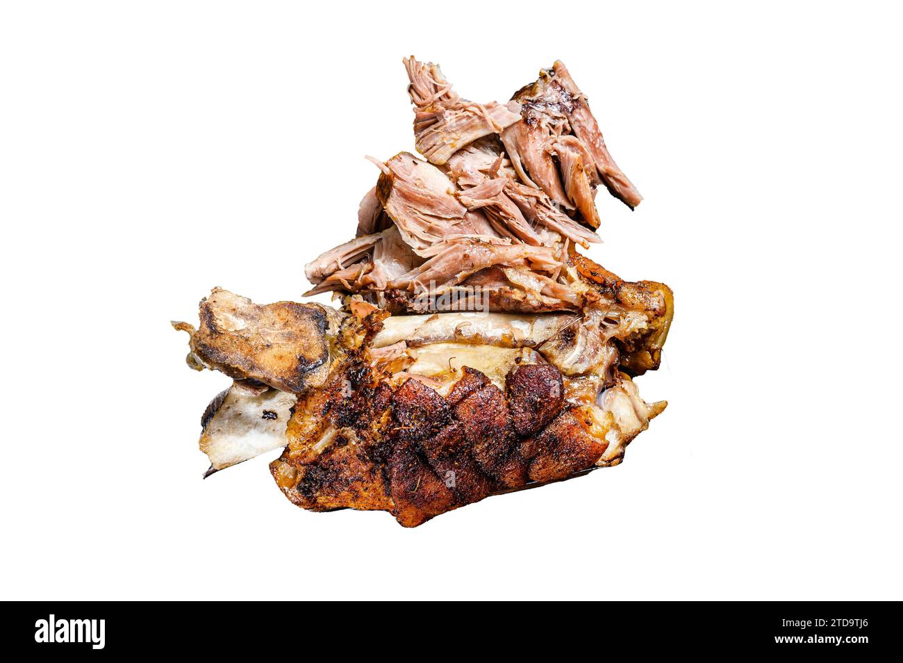 Roasted and cut German pork knuckle eisbein meat on a wooden board with ...