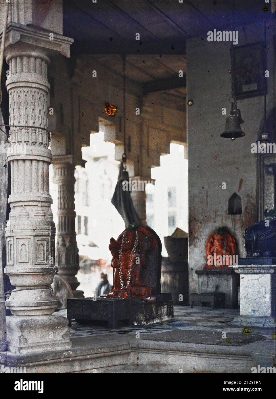 Bombay, India Altars dedicated to Hanuman (foreground) and Ganesh ...