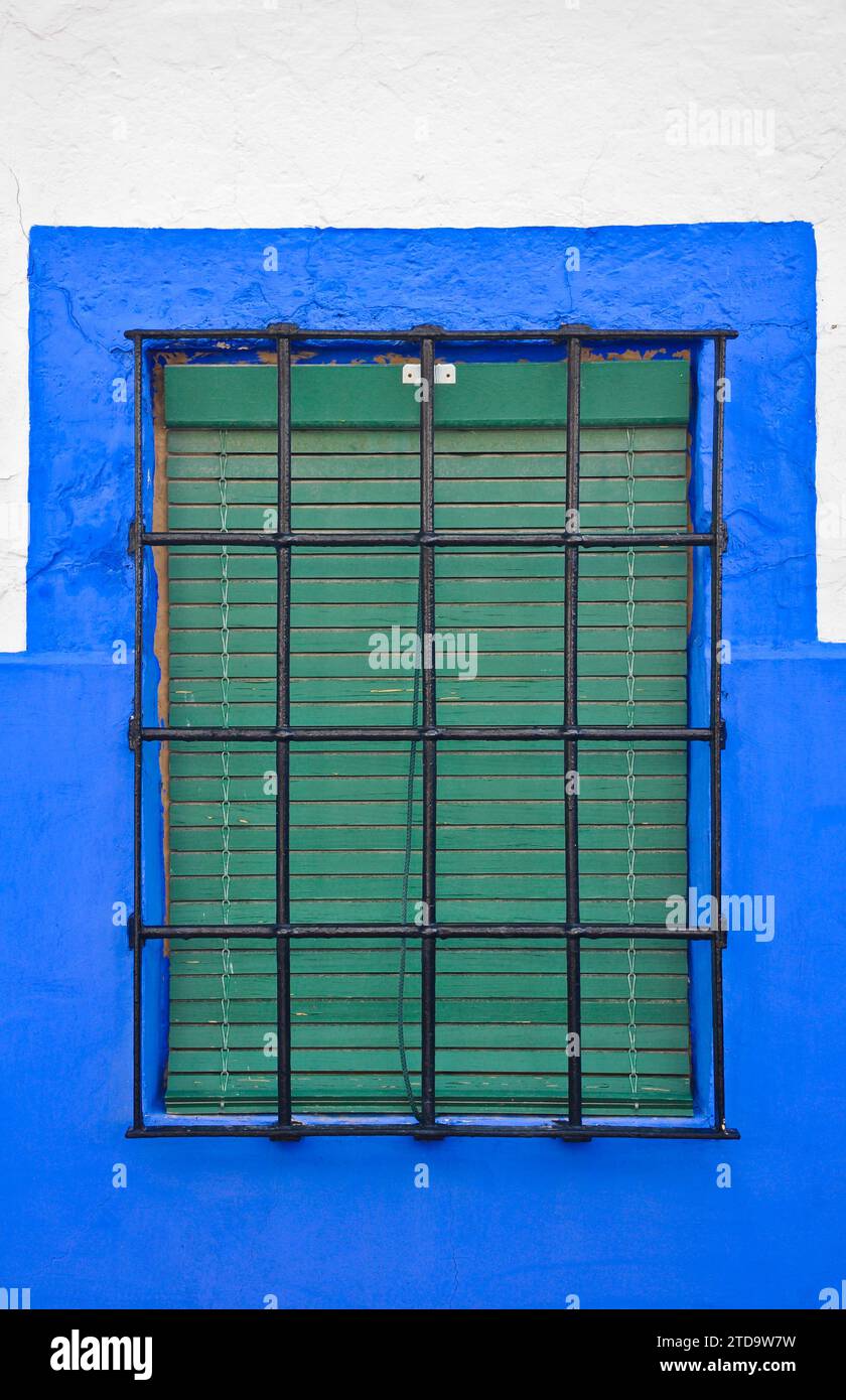 Traditional Spanish windows with blue frame Stock Photo - Alamy