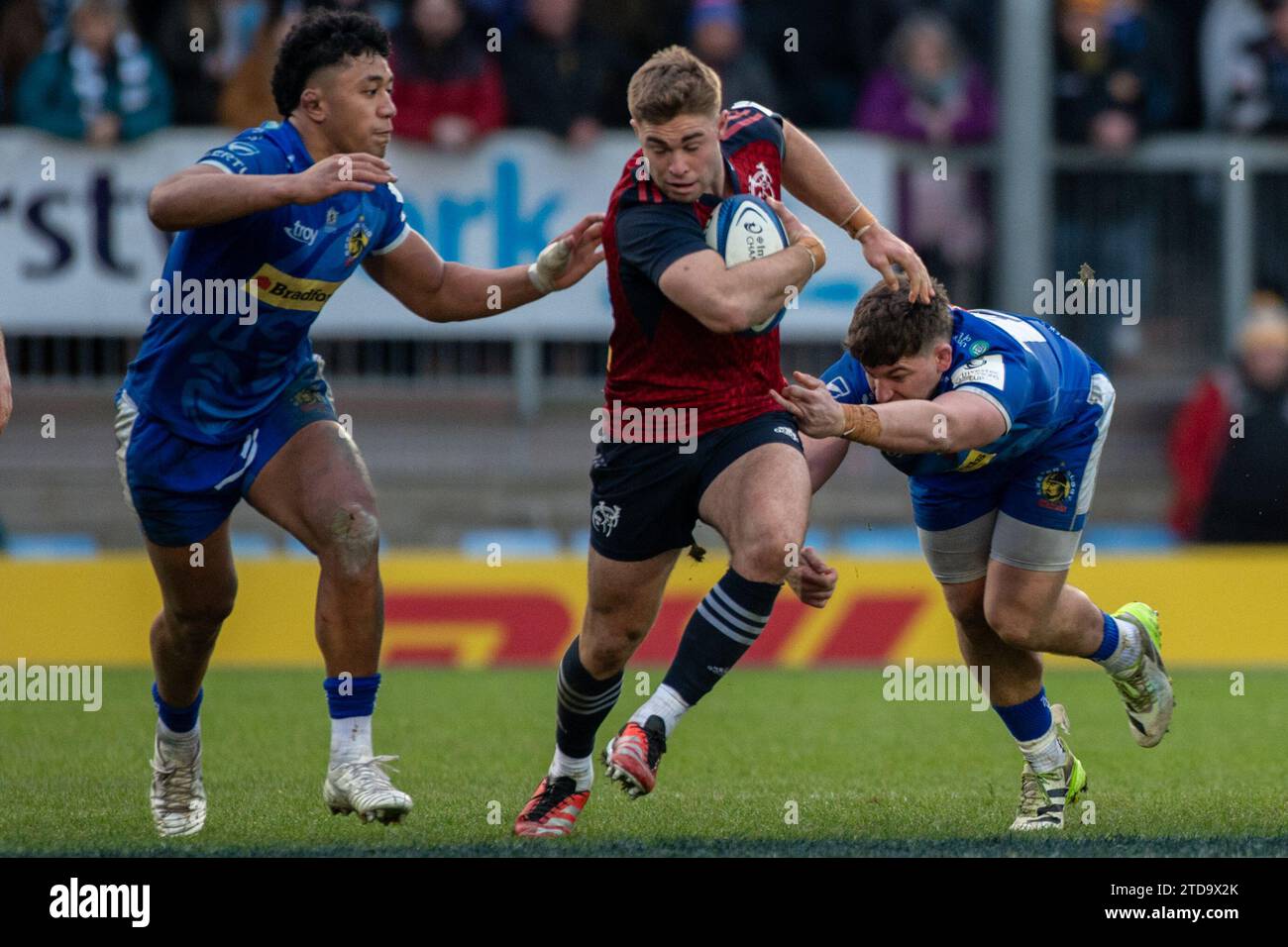 Jack Crowley of Munster runs with the ball during the Investec ...