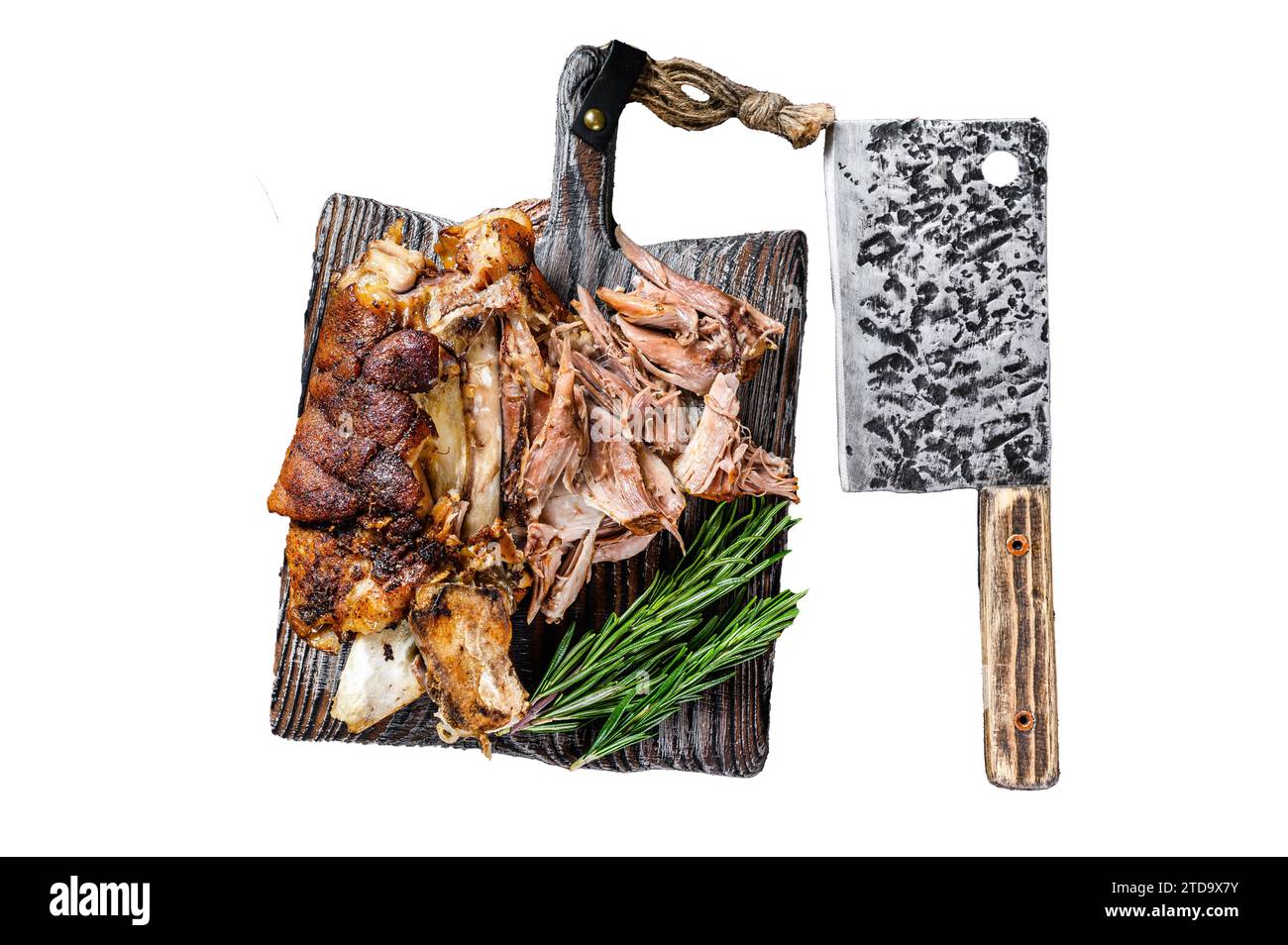 Roasted and cut German pork knuckle eisbein meat on a wooden board with ...