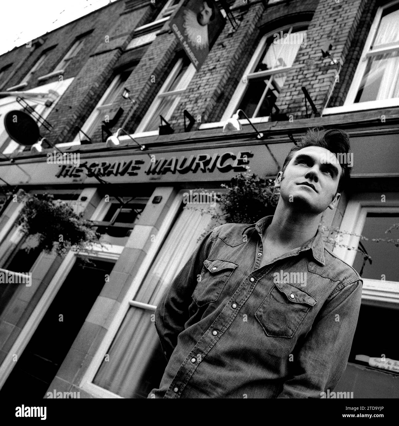 Powerful Black & white mid-shot portrait of legendary rockstar, singer ...