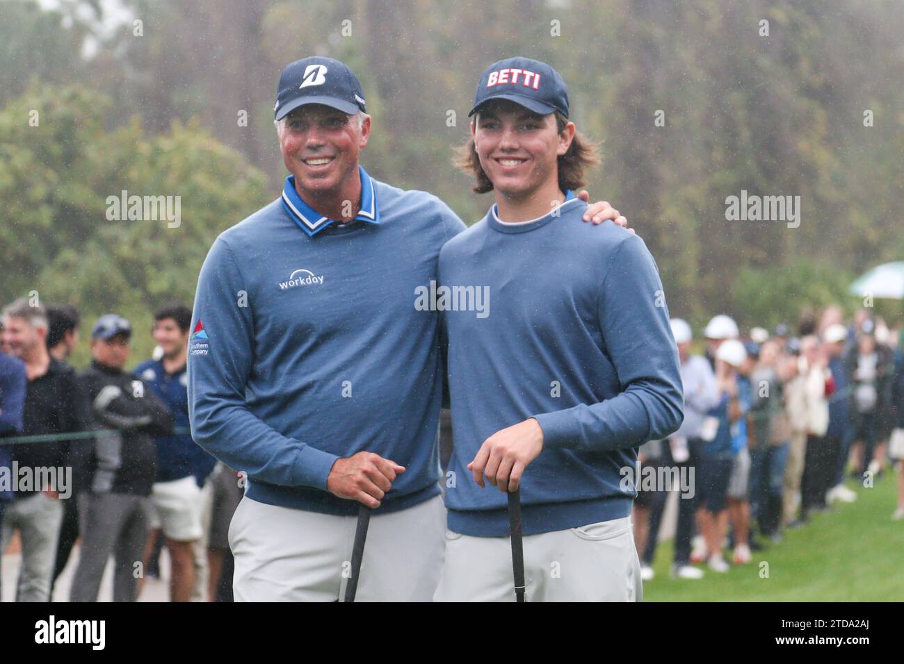 Orlando, Florida, USA. 17th Dec, 2023. Matt Kuchar (L) and Cameron Kuchar pose for photos on the ...