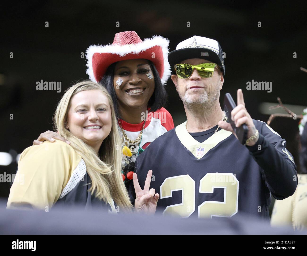 New Orleans, USA. 17th Dec, 2023. A trio of New Orleans Saints fans ...