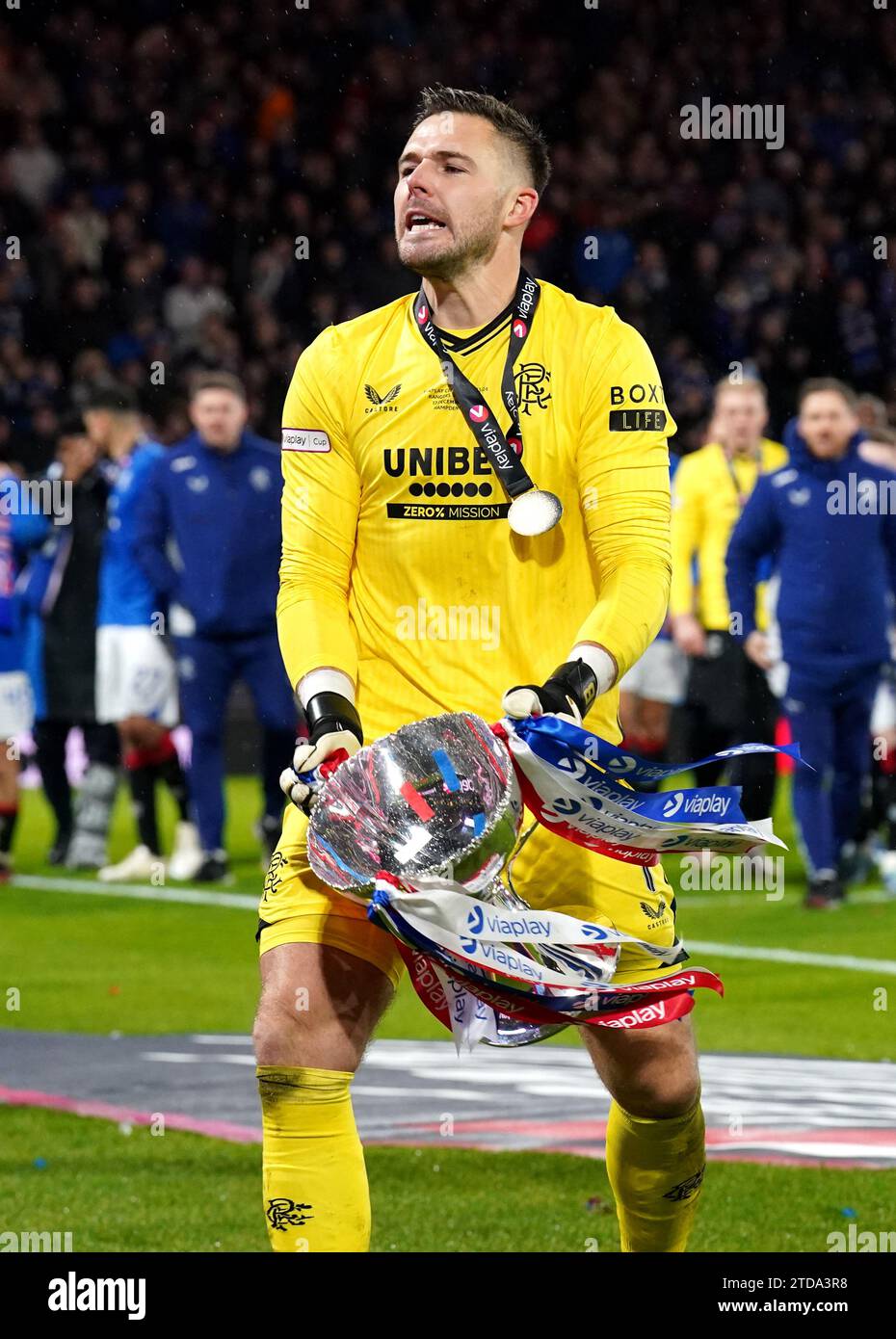 Rangers goalkeeper Jack Butland celebrates with the trophy after ...