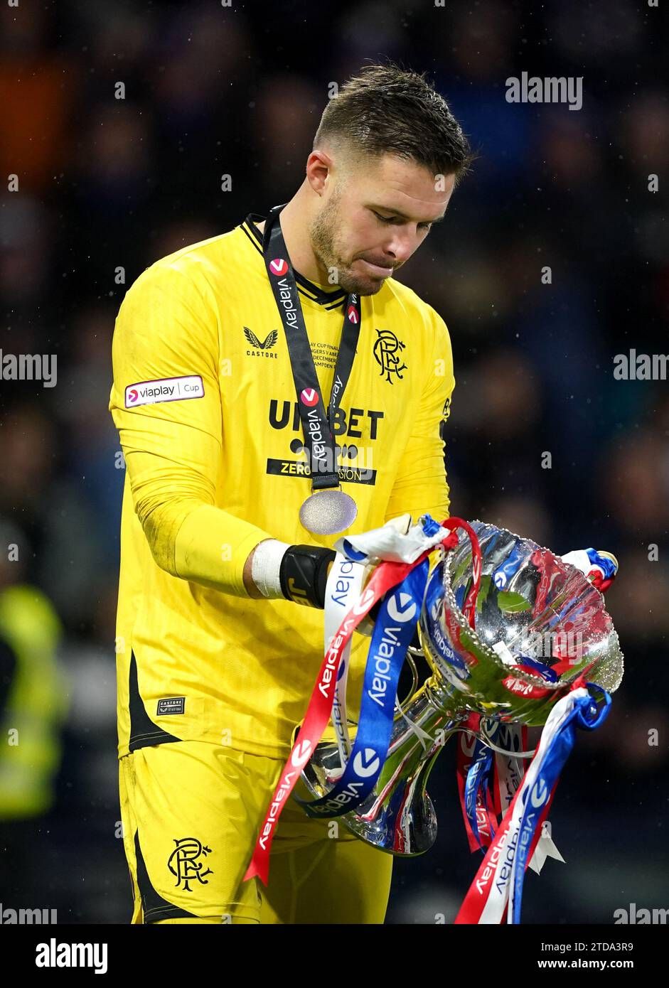 Rangers goalkeeper Jack Butland celebrates with the trophy after ...