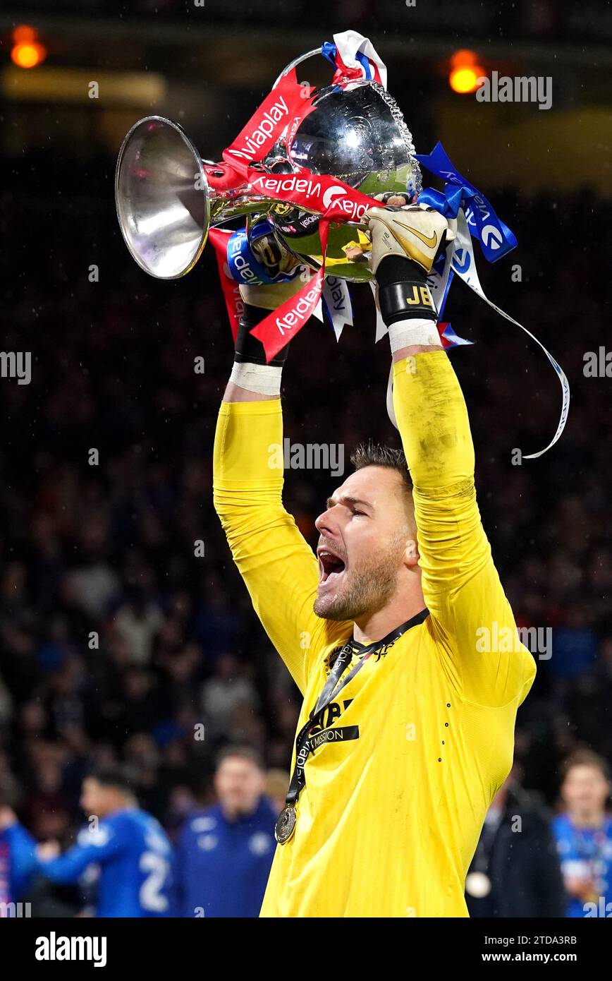 Rangers goalkeeper Jack Butland celebrates with the trophy after ... Rangers goalkeeper Jack Butland celebrates with the trophy after ...