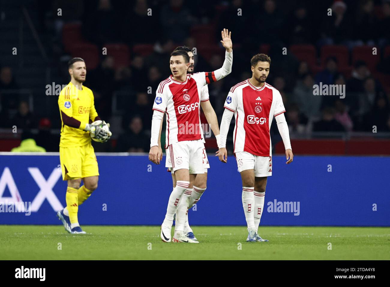 AMSTERDAM - (l-r) Ajax goalkeeper Diant Ramaj, Steven Berghuis of Ajax, Josip Sutalo of Ajax ...