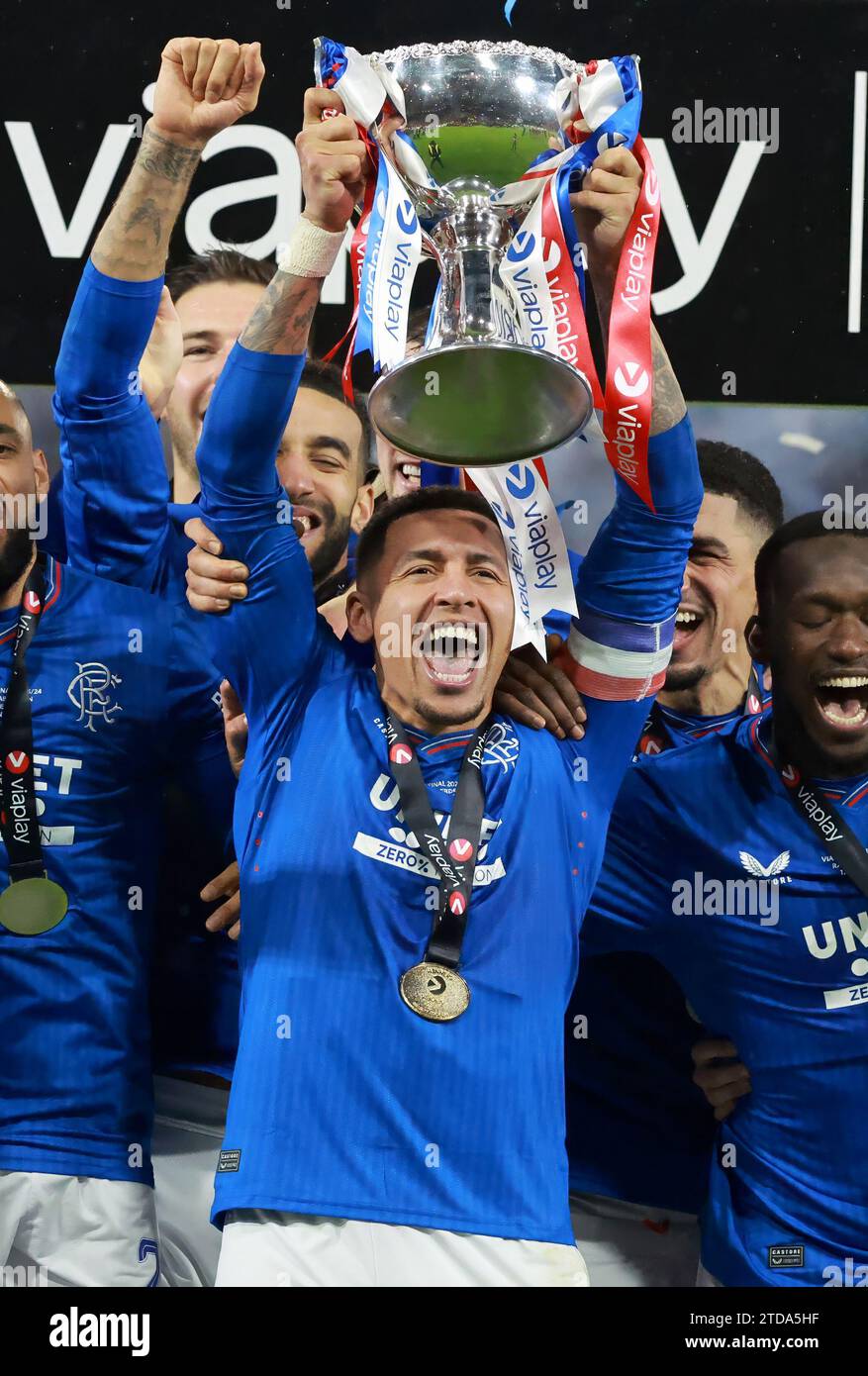 Rangers' James Tavernier lifts the trophy as Rangers' players celebrate ...