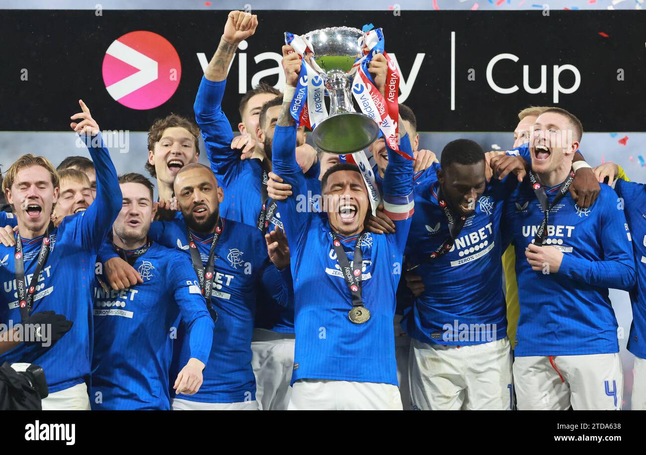 Rangers' James Tavernier lifts the trophy as Rangers' players celebrate ...