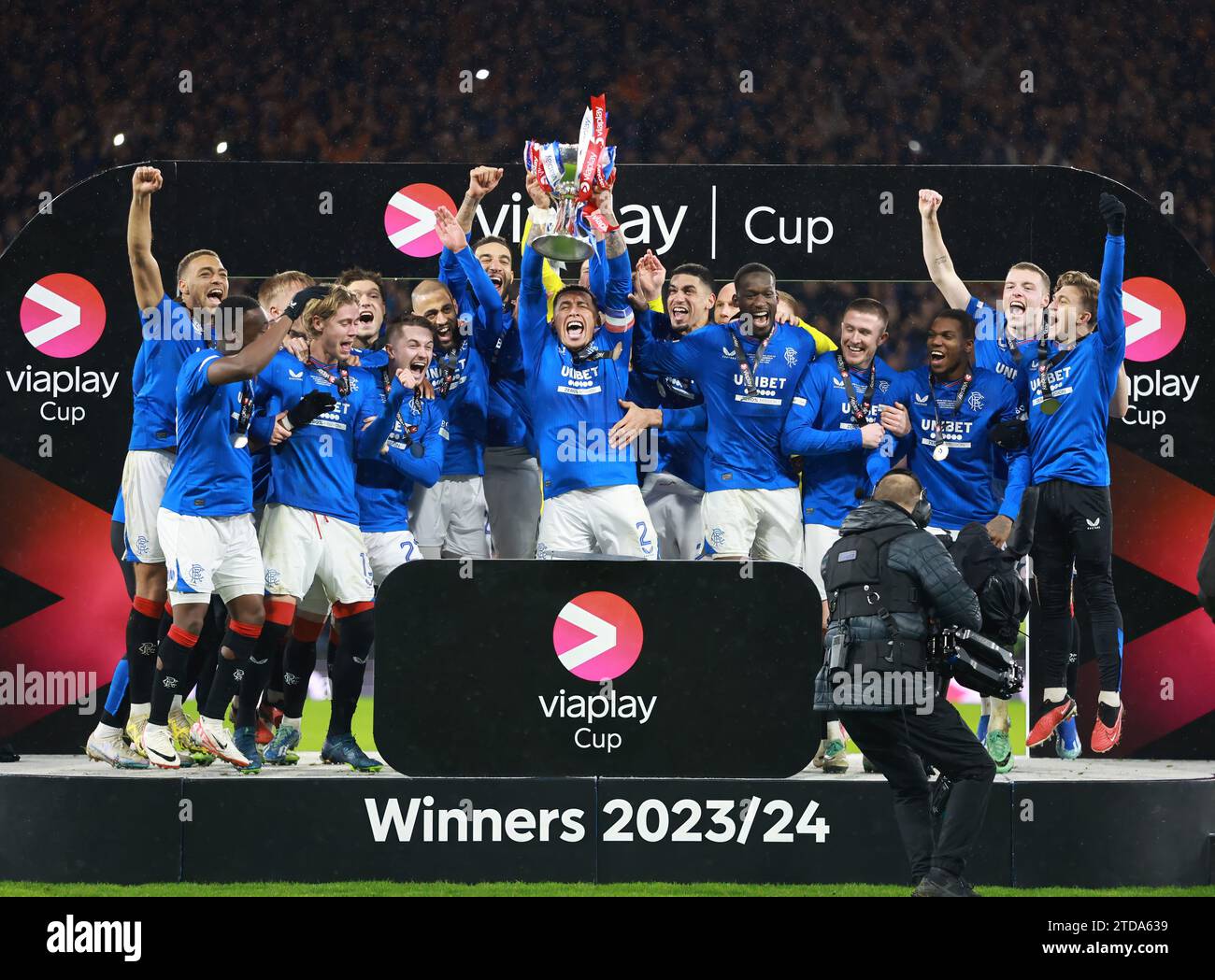 Rangers' James Tavernier lifts the trophy as Rangers' players celebrate ... Rangers' James Tavernier lifts the trophy as Rangers' players celebrate ...