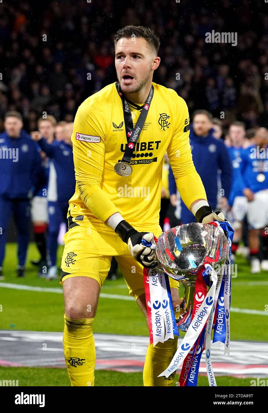 Rangers goalkeeper Jack Butland celebrates with the trophy after ...