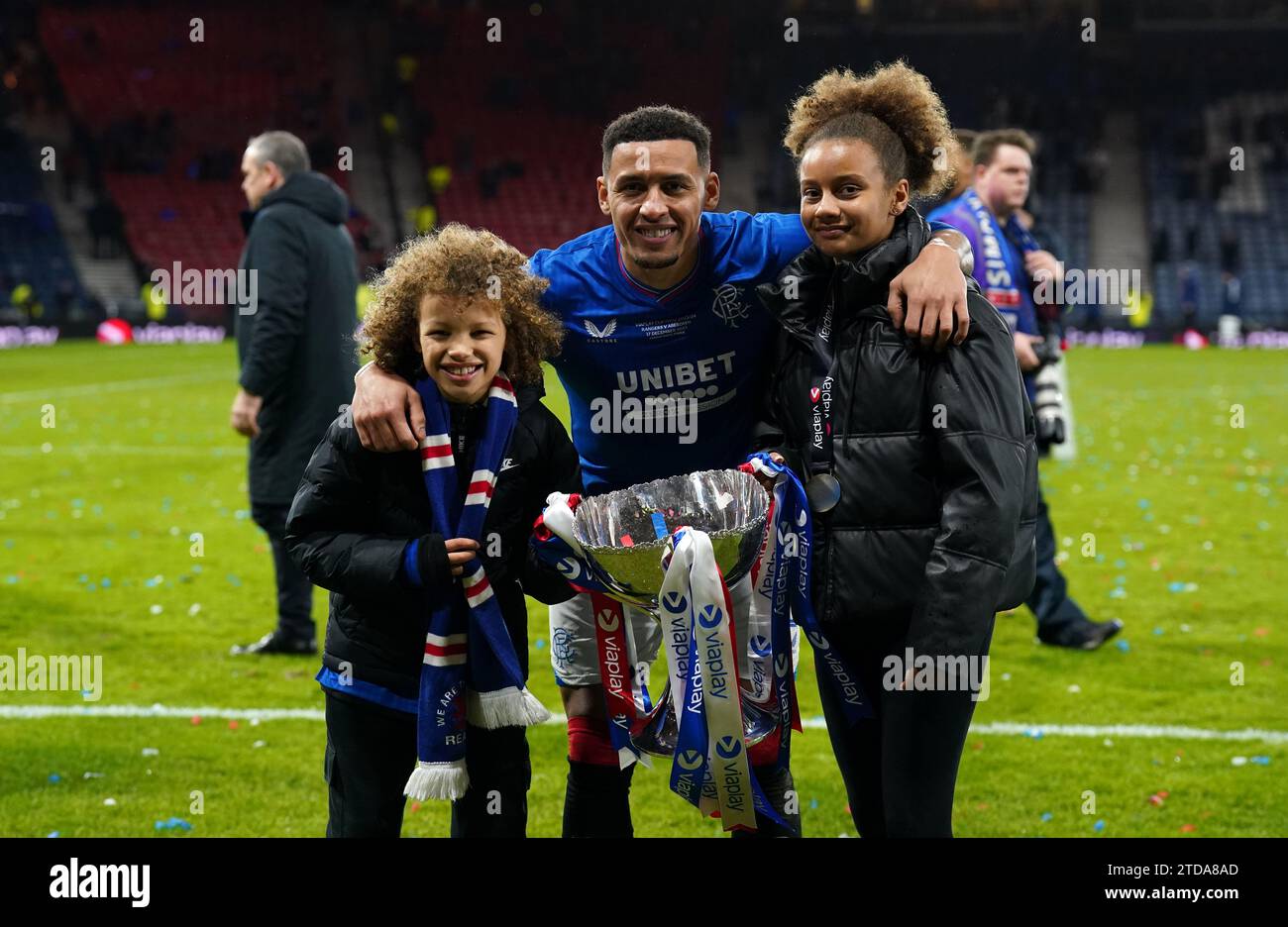 Rangers' James Tavernier and family celebrate with the trophy after ...