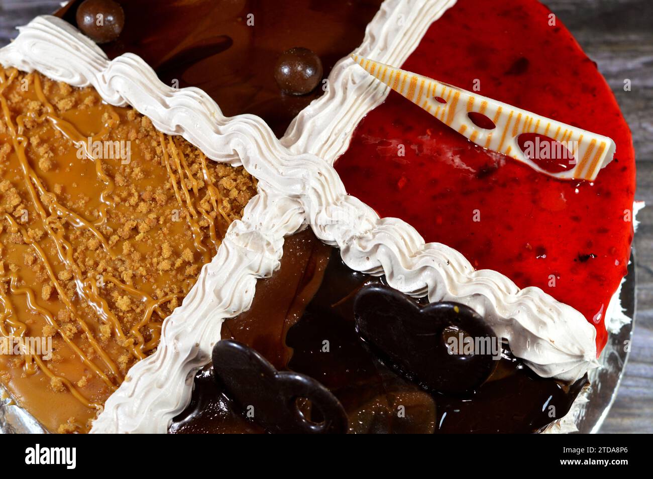 A birthday cake, four different quarters spongy creamy cake for ...