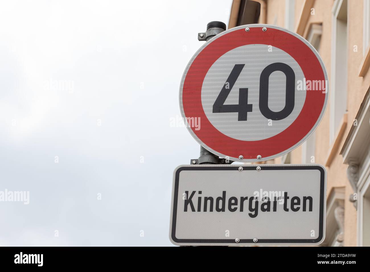 German 40 km/h Speed Limit Sign with Kindergarten Warning: Road Safety ...
