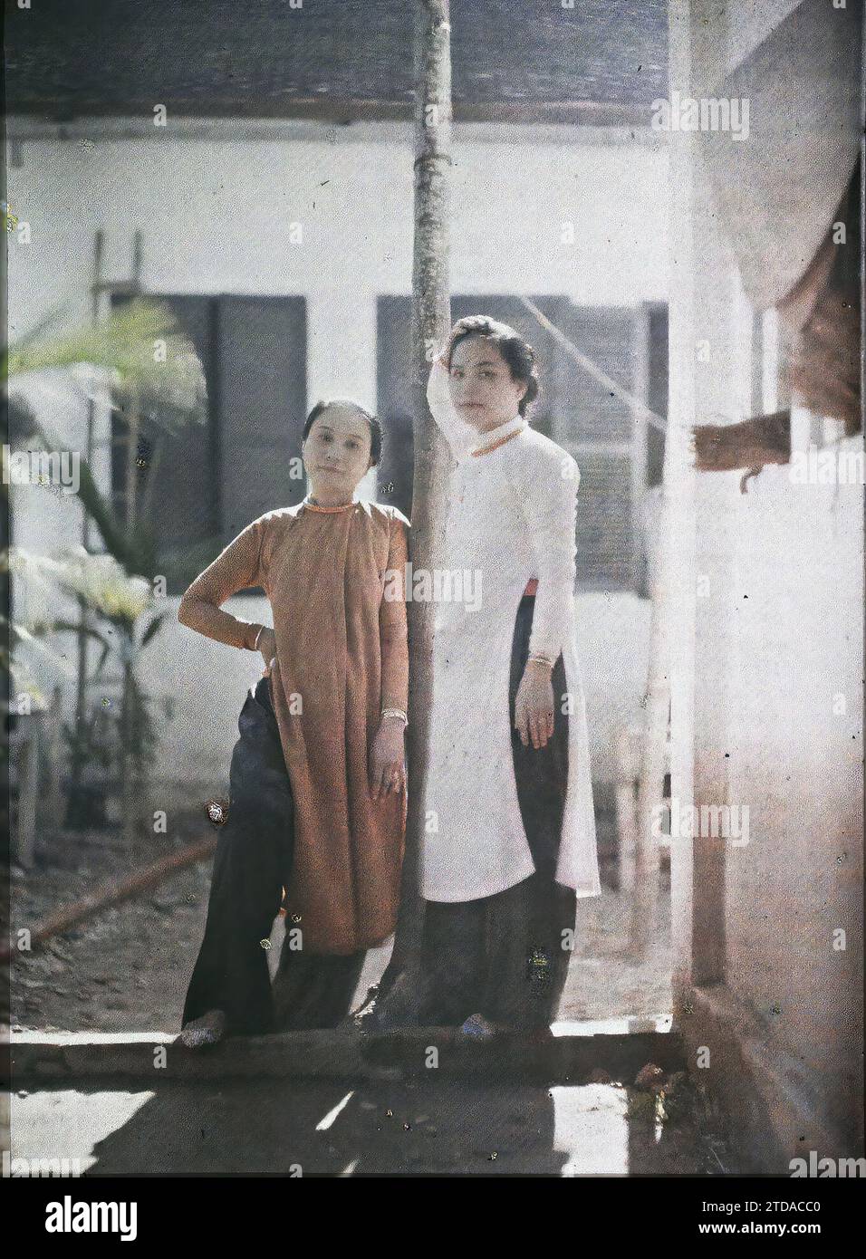 Tonkin, Indochina Two young upper-class Saigon women, standing in the ...