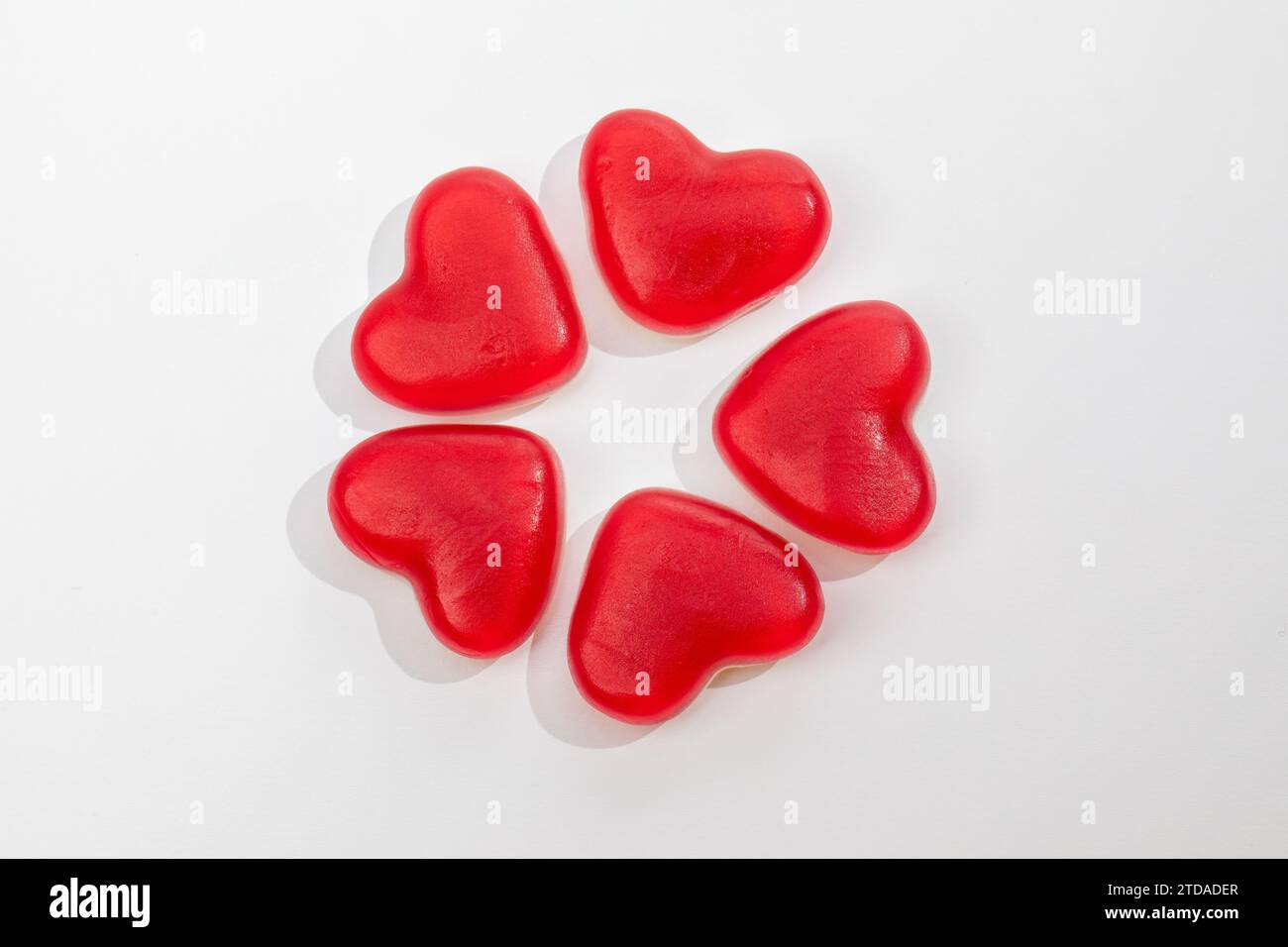 Love Concept with red hearts candy Stock Photo - Alamy