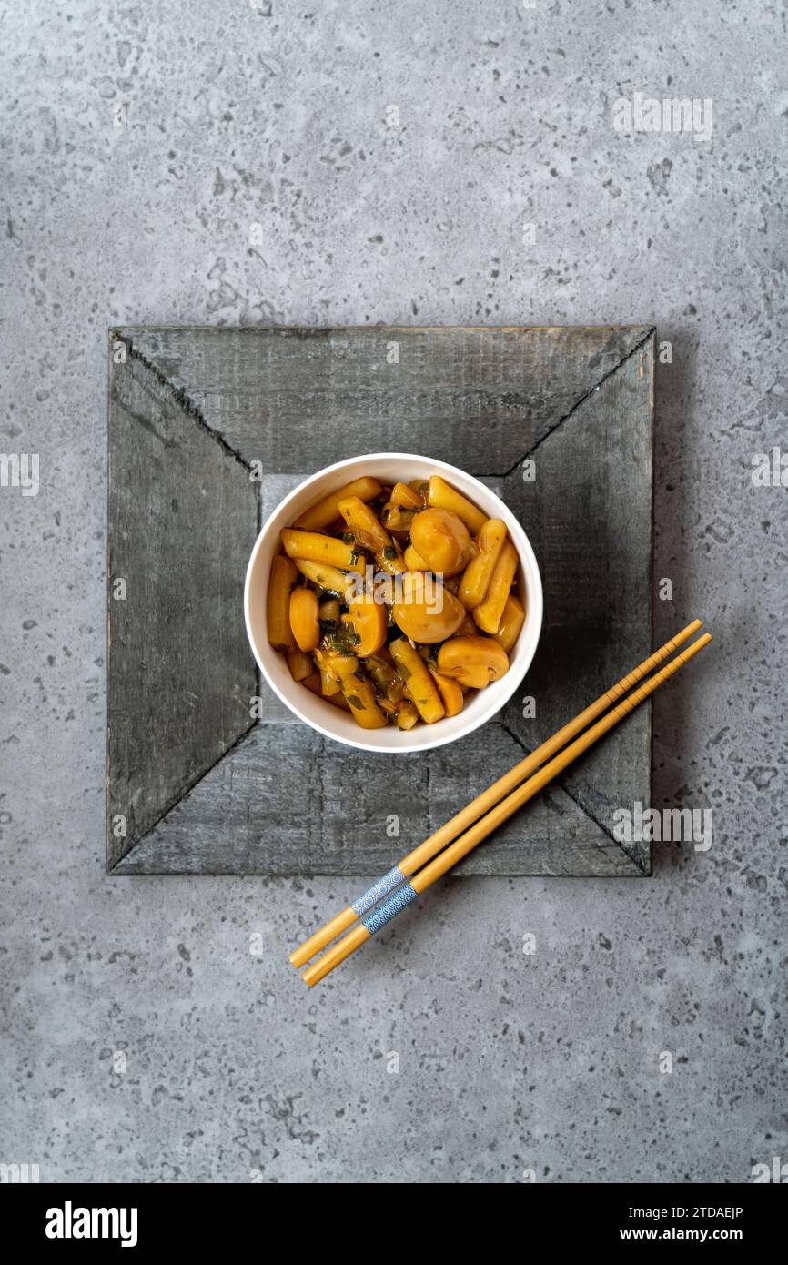 Korea Tteokbokki or simmered rice cake with mushroom and sauce Stock ...