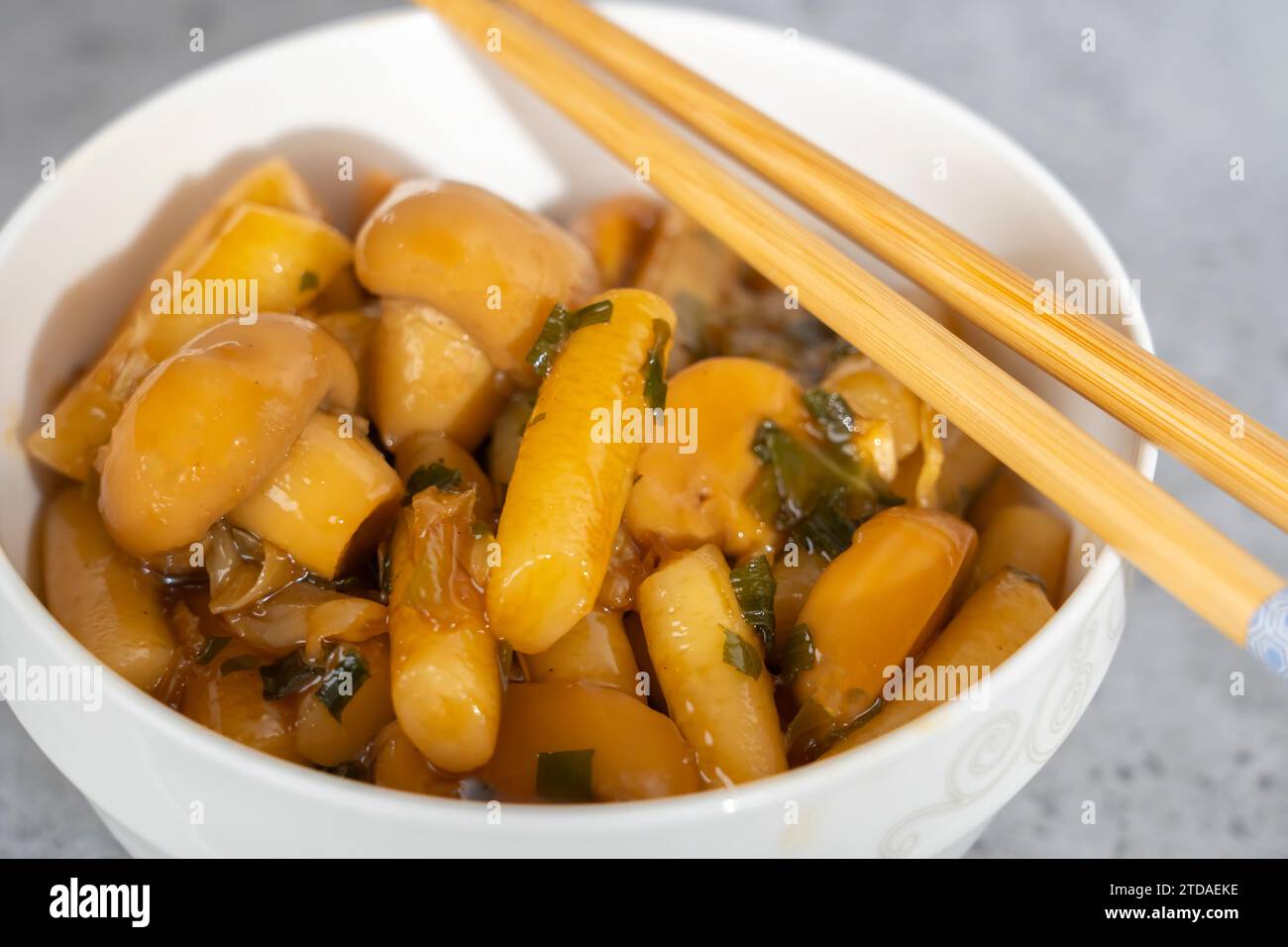 Korea Tteokbokki or simmered rice cake with mushroom and sauce Stock ...