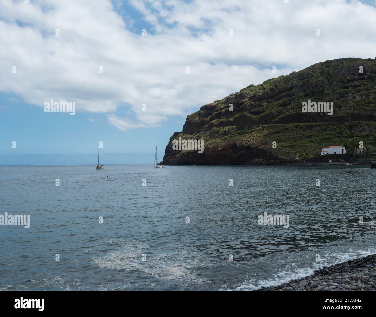 Sailing ships and yachts at Machico bay, Madeira, Portugal. Machico is ...