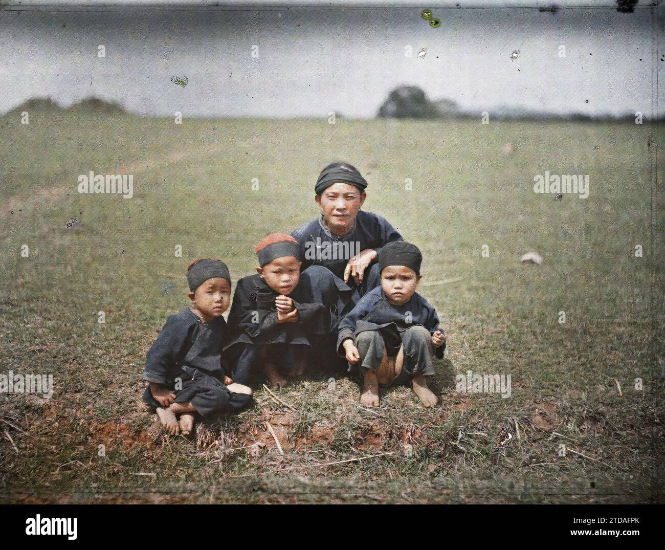 Ky-lu' a, Tonkin, Indochina A Thai family, dressed in blue, on the ...