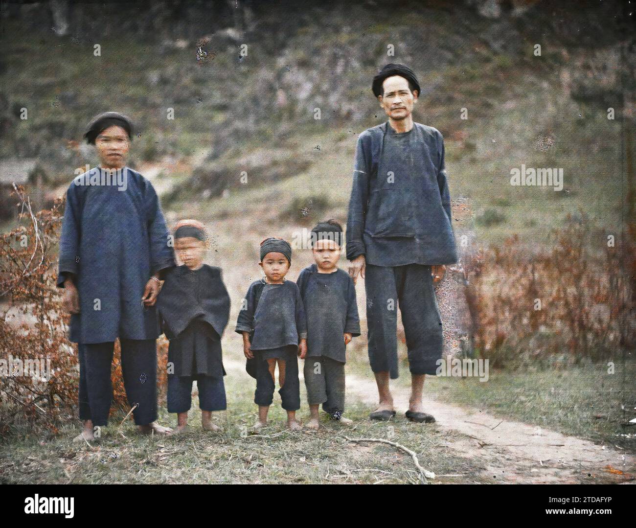 Ky-lu' a, Tonkin, Indochina A Thai family, dressed in blue, near the ...