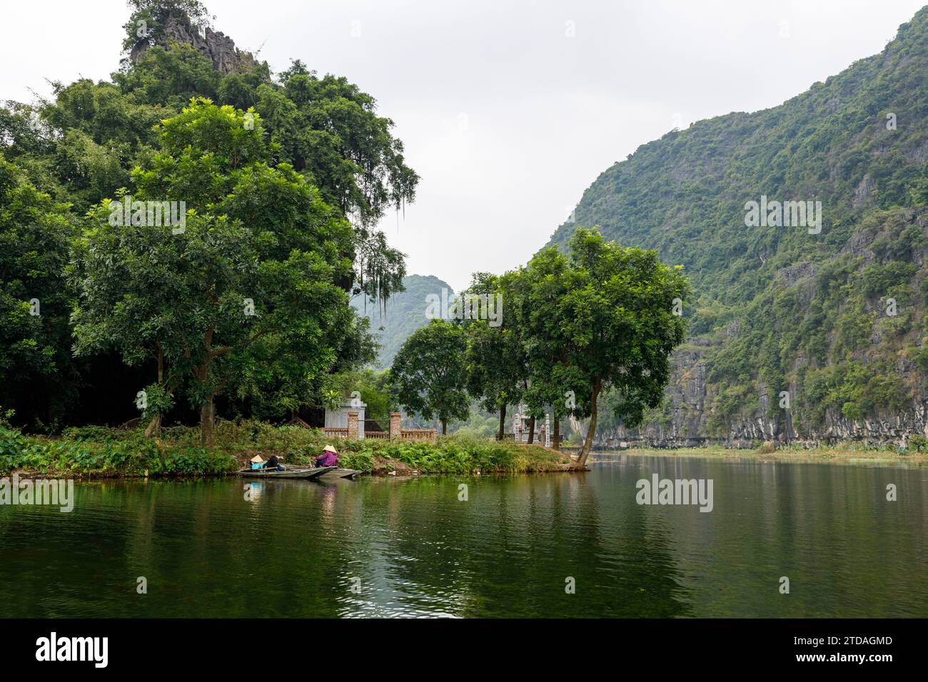 Tourist on a boat tour at Tam Coc in vietnam Stock Photo - Alamy