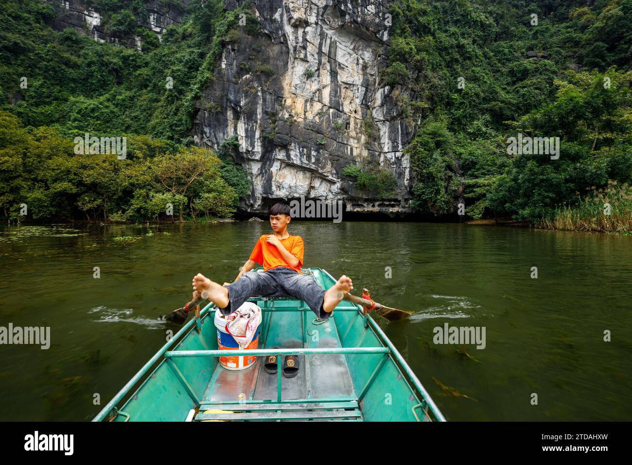 Tourist on a boat tour at Tam Coc in vietnam Stock Photo - Alamy