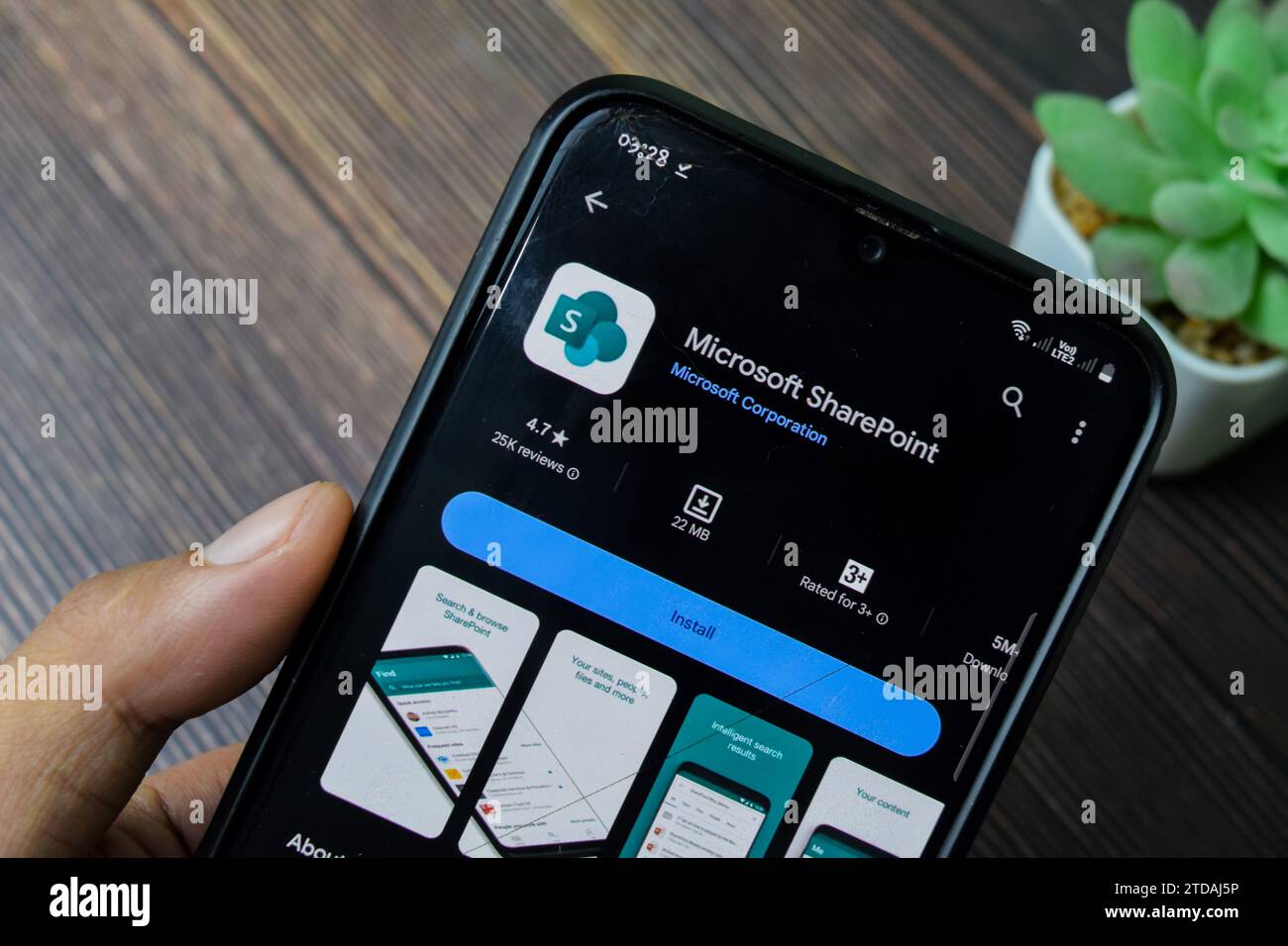 Microsoft SharePoint application on Smartphone screen. Microsoft ...