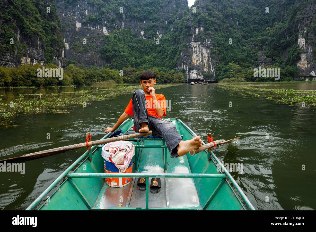 Tourist on a boat tour at Tam Coc in vietnam Stock Photo - Alamy