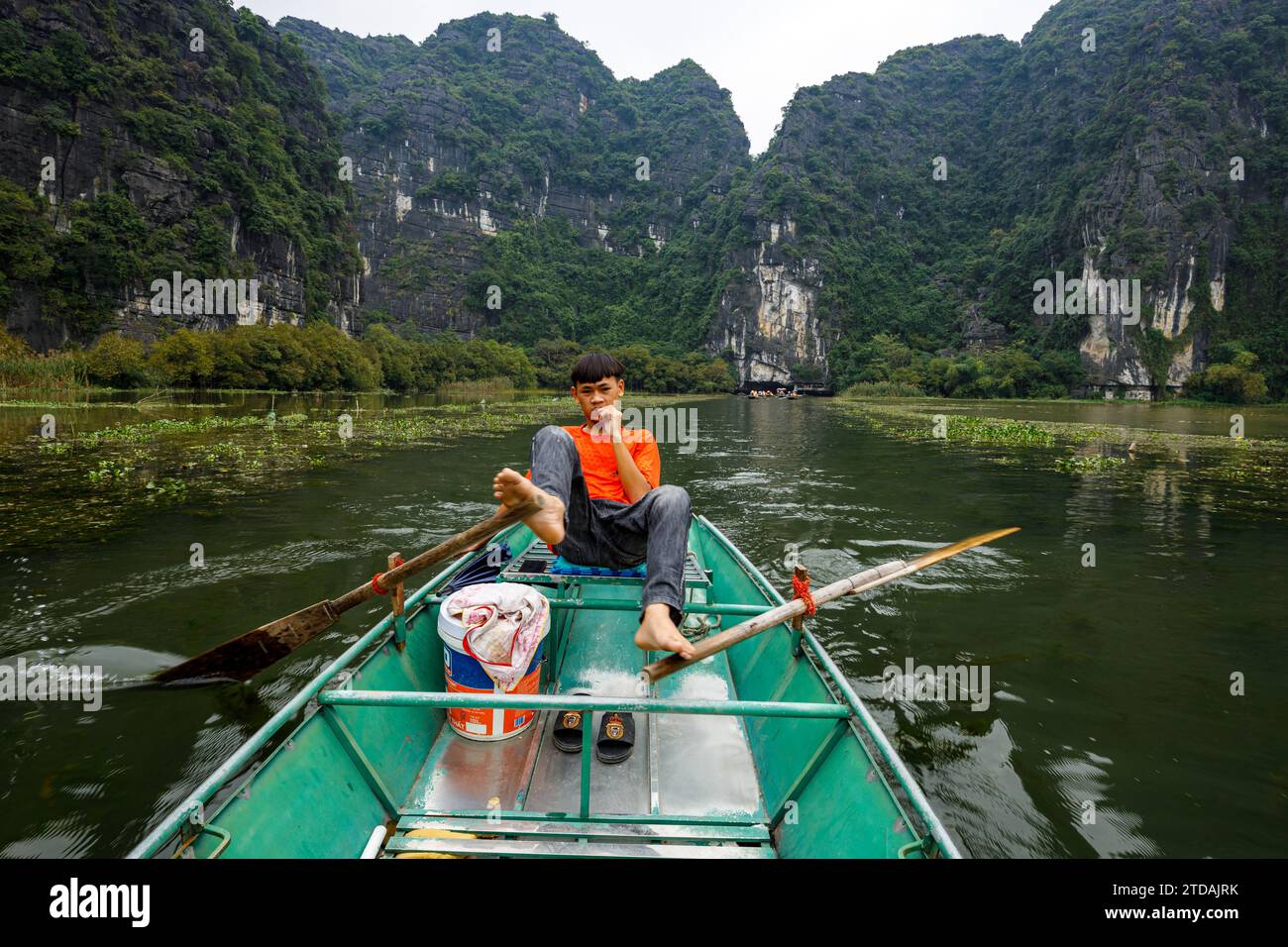 Tourist on a boat tour at Tam Coc in vietnam Stock Photo - Alamy