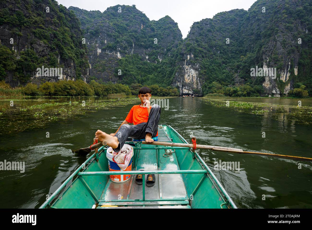 Tourist on a boat tour at Tam Coc in vietnam Stock Photo - Alamy