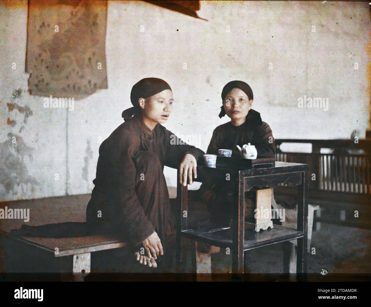 Hà-nôi, Hainoi Vietnam, Tonkin, Indochina Two novices seated near a ...