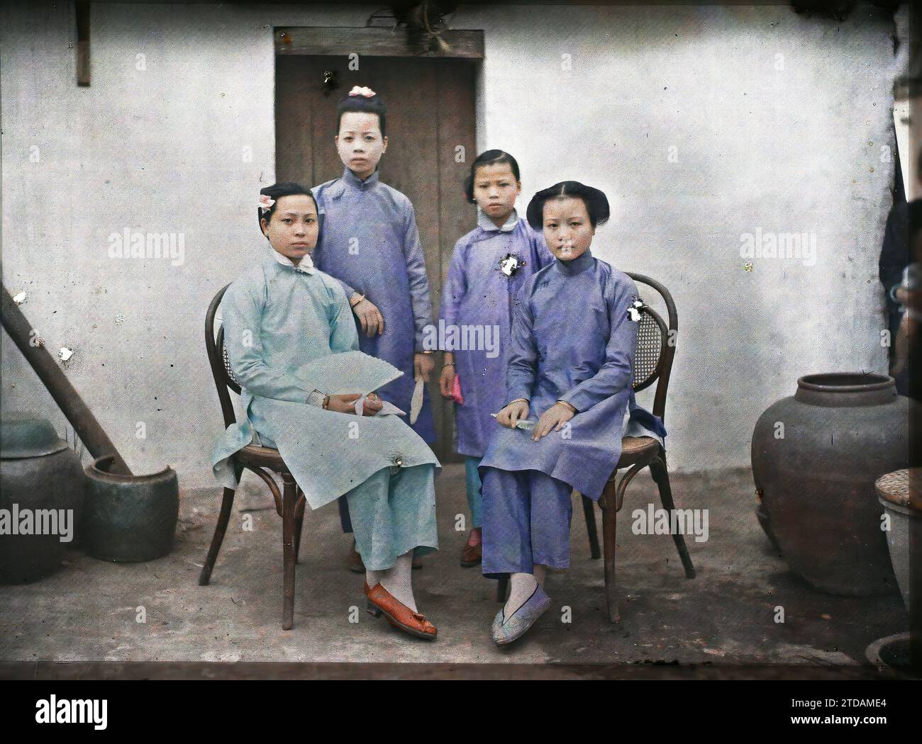Tonkin, Indochina Four young Chinese women in an interior courtyard ...