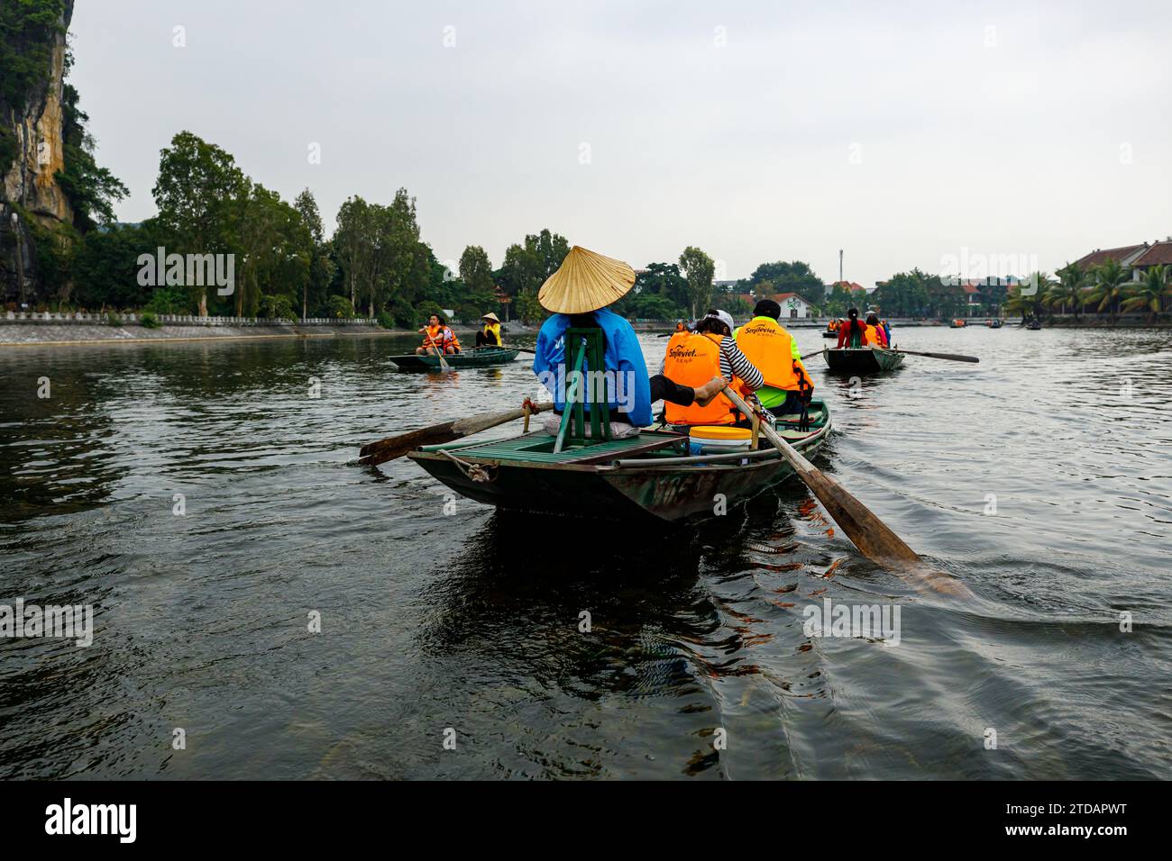 Tourist on a boat tour at Tam Coc in vietnam Stock Photo - Alamy