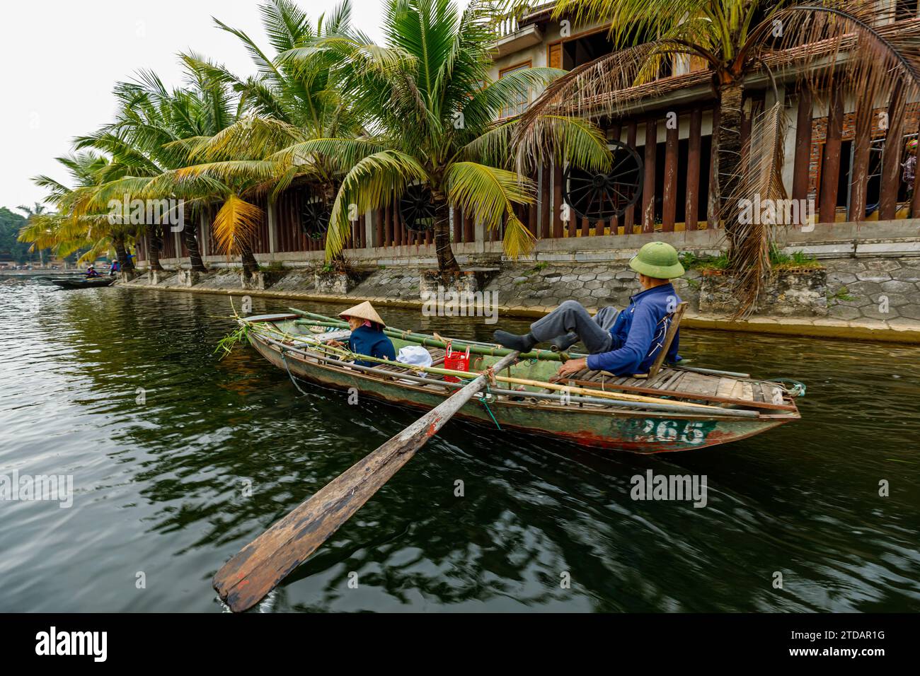 Tourist on a boat tour at Tam Coc in vietnam Stock Photo - Alamy