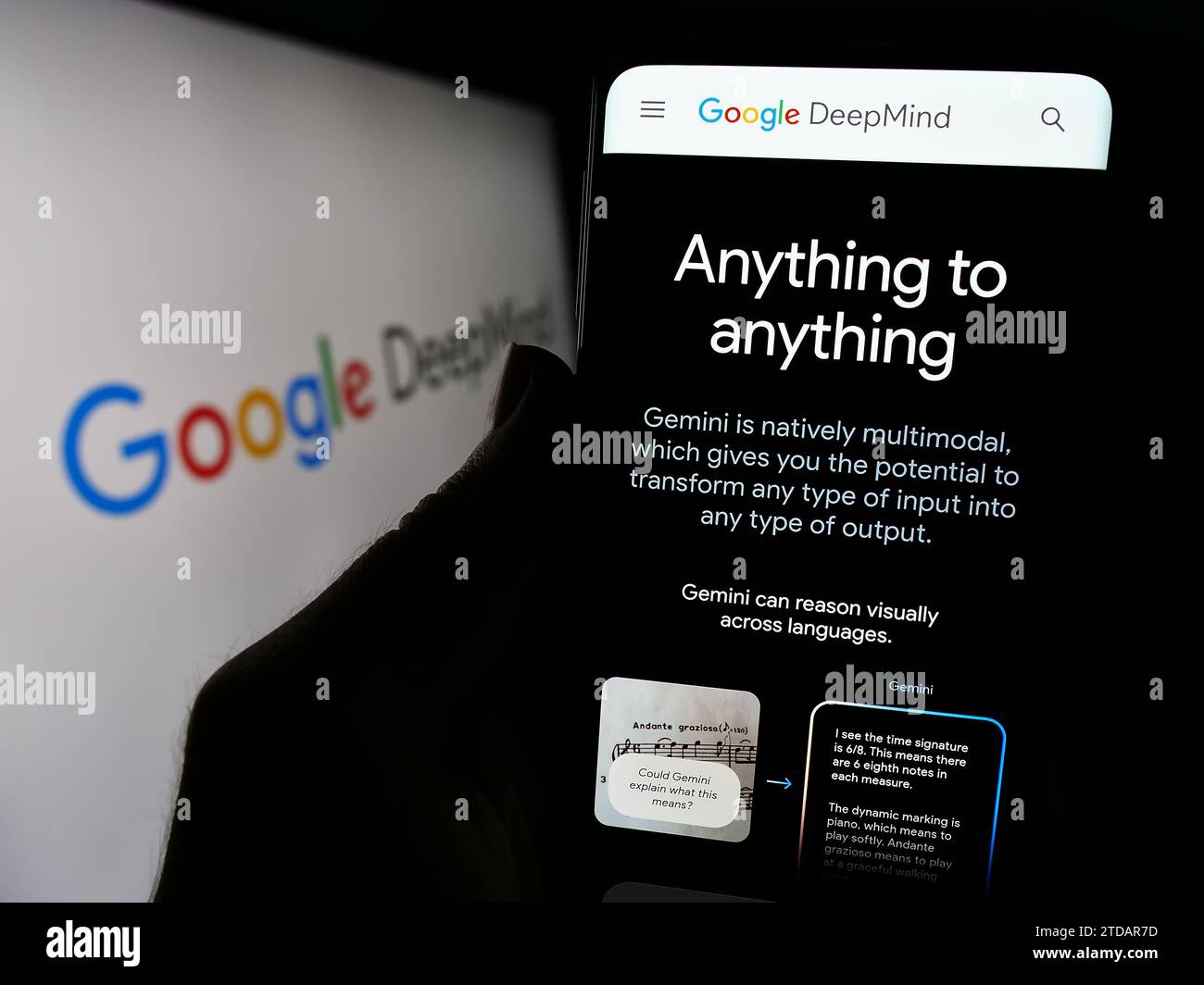 Person holding cellphone with webpage of artificial intelligence ... Person holding cellphone with webpage of artificial intelligence ...