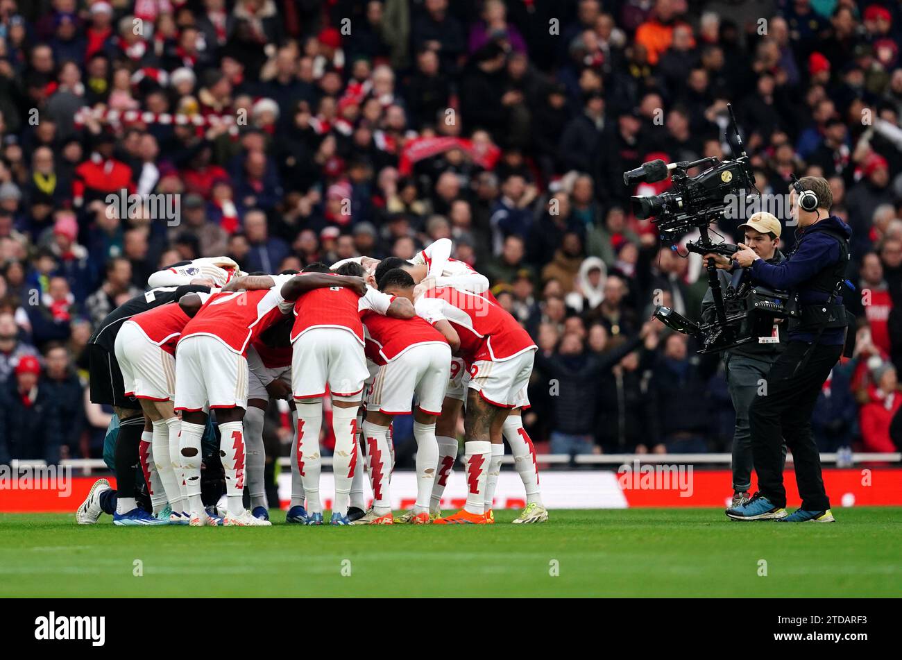 Arsenal players in a group huddle before the Premier League match at ...