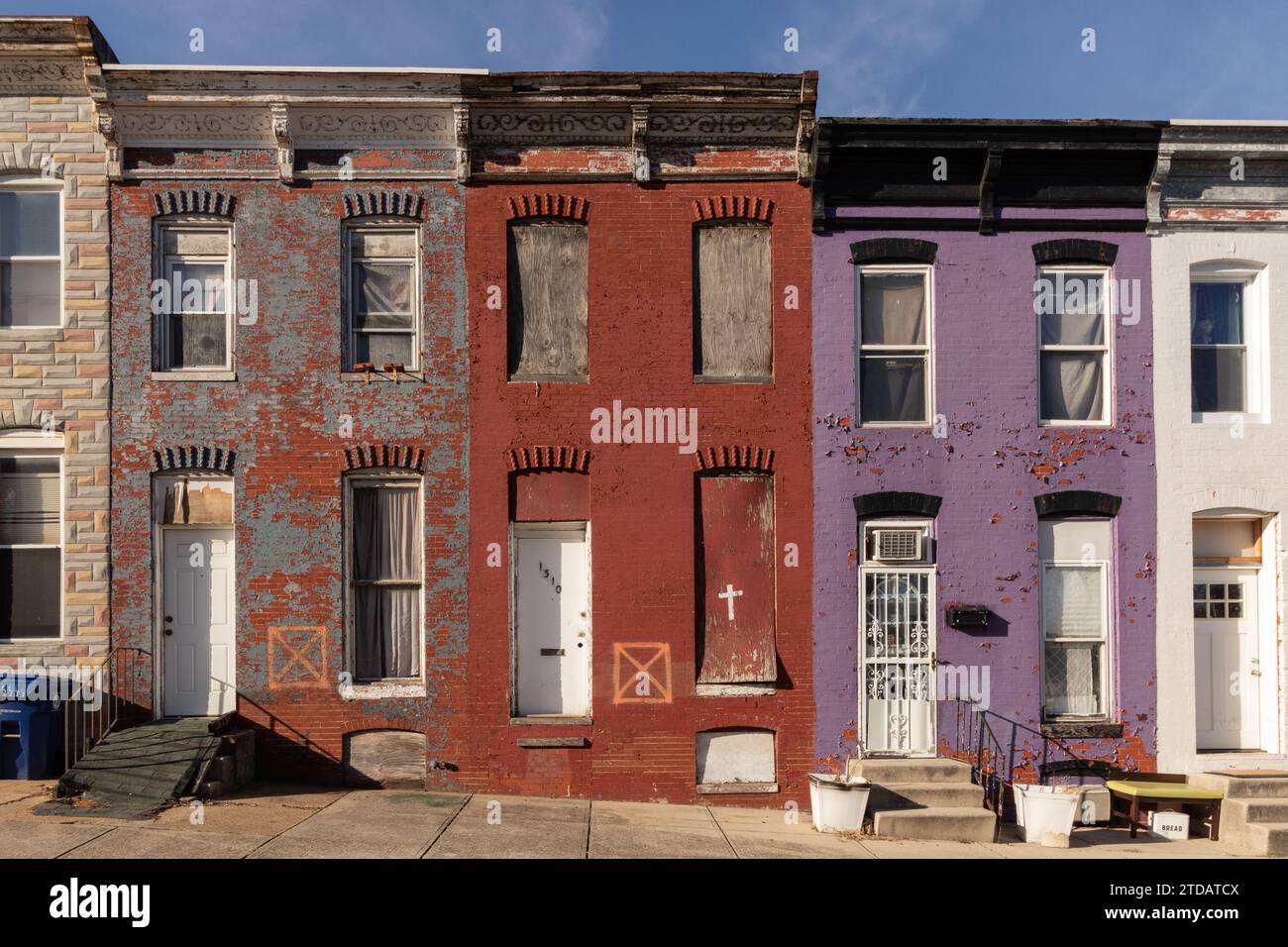 Colorful Vacant Row houses with do not enter symbols for the Fire ...