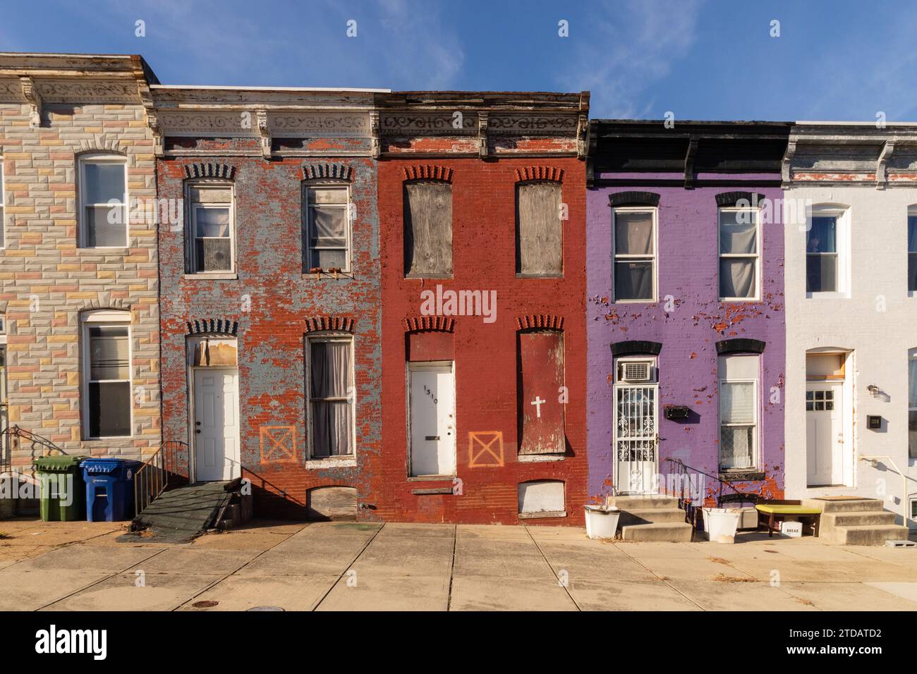 Colorful Vacant Row houses with do not enter symbols for the Fire ...